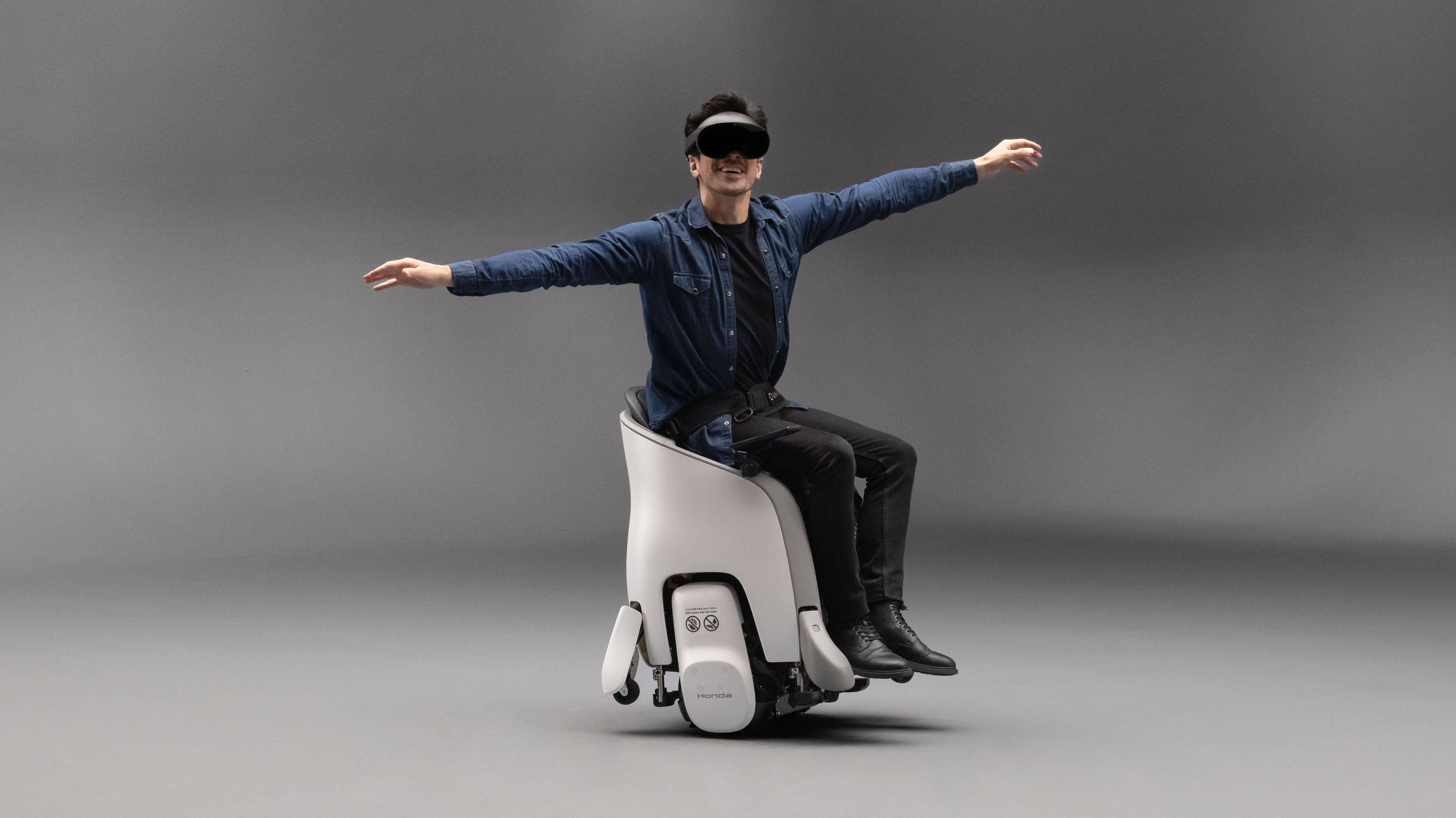 Honda combines VR headset with its hands-free Uni-One mobility chair | Top Gear